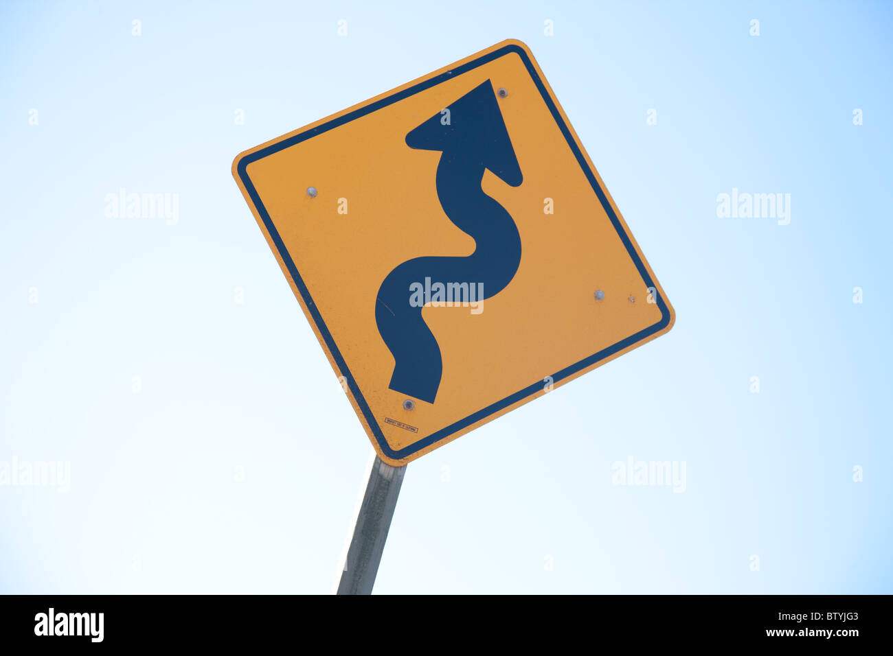 Highway one california a sign warning of bends in the road Stock Photo ...