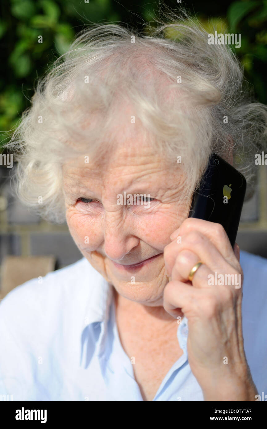 Old lady learning mobile phone hi-res stock photography and images - Alamy
