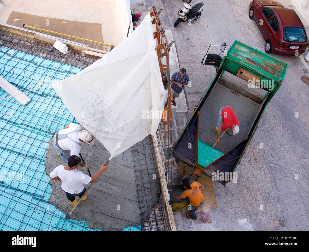 Greek construction workers redoing the roof of a house Stock Photo - Alamy