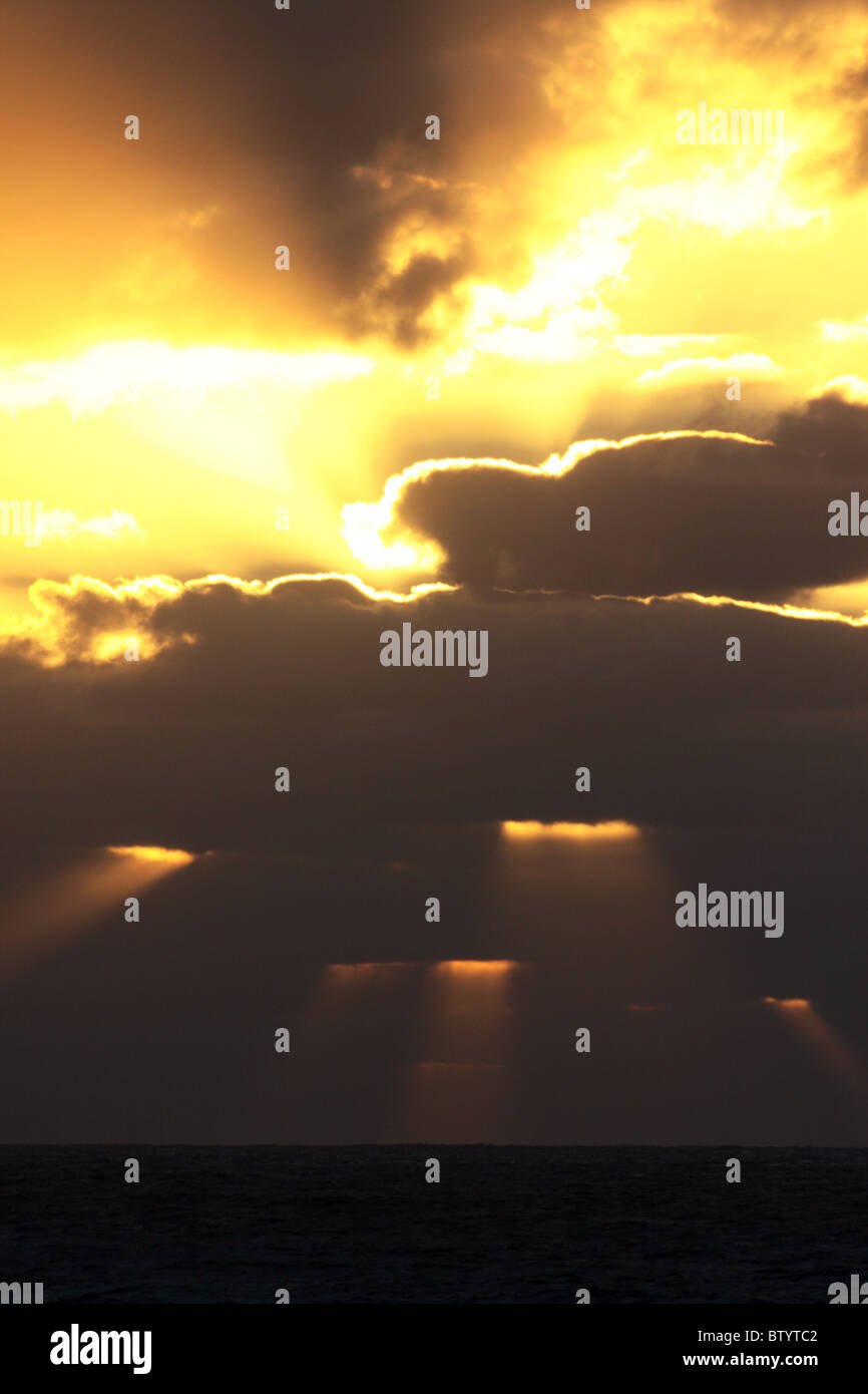 Pink clouds over ocean hi-res stock photography and images - Alamy