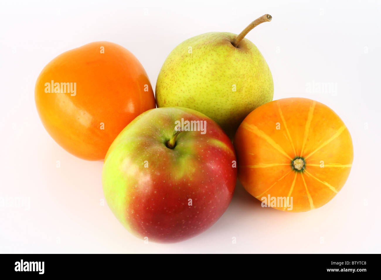 Four bright fruit Stock Photo - Alamy