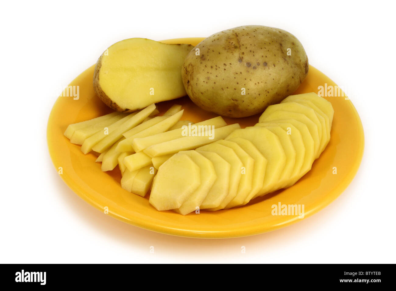 Raw a potato cut by slices Stock Photo - Alamy