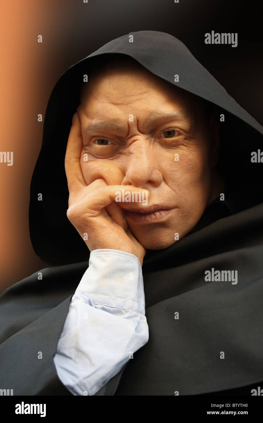 Wax figure of the monk Stock Photo - Alamy