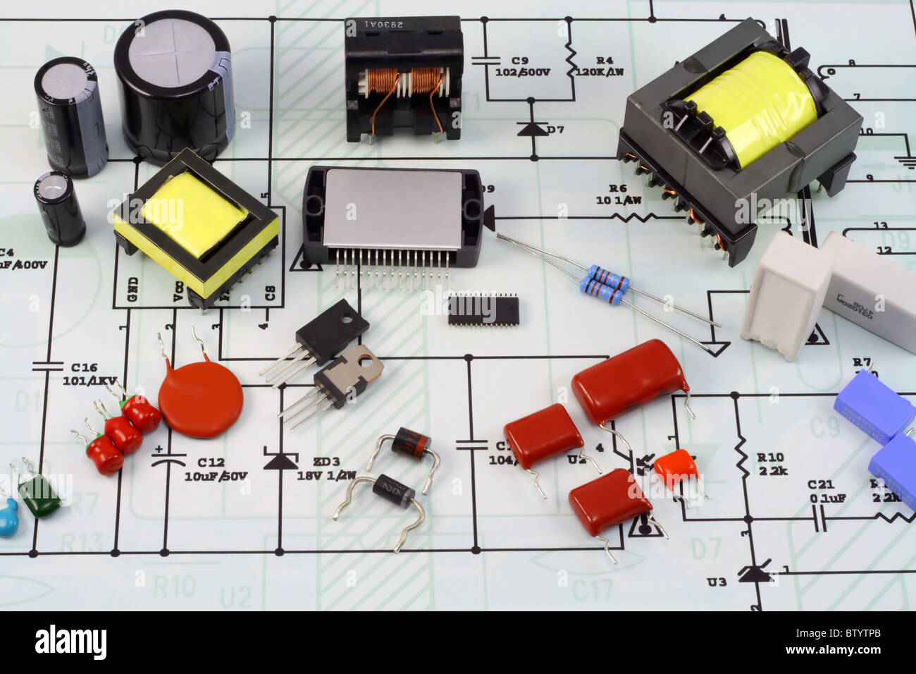 Electronic components and the electric scheme Stock Photo - Alamy