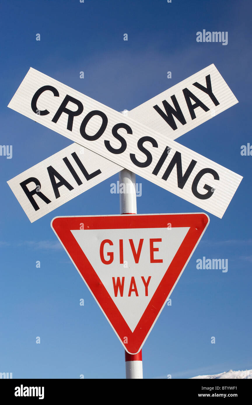 Railroad crossing and give way road sign hi-res stock photography and ...
