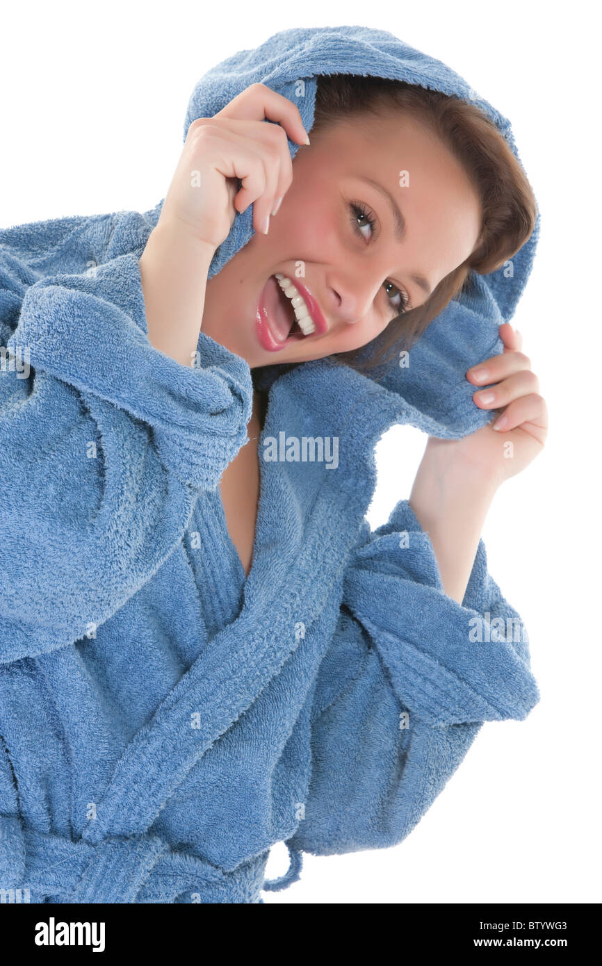 Beautiful woman in blue bathrobe Stock Photo - Alamy