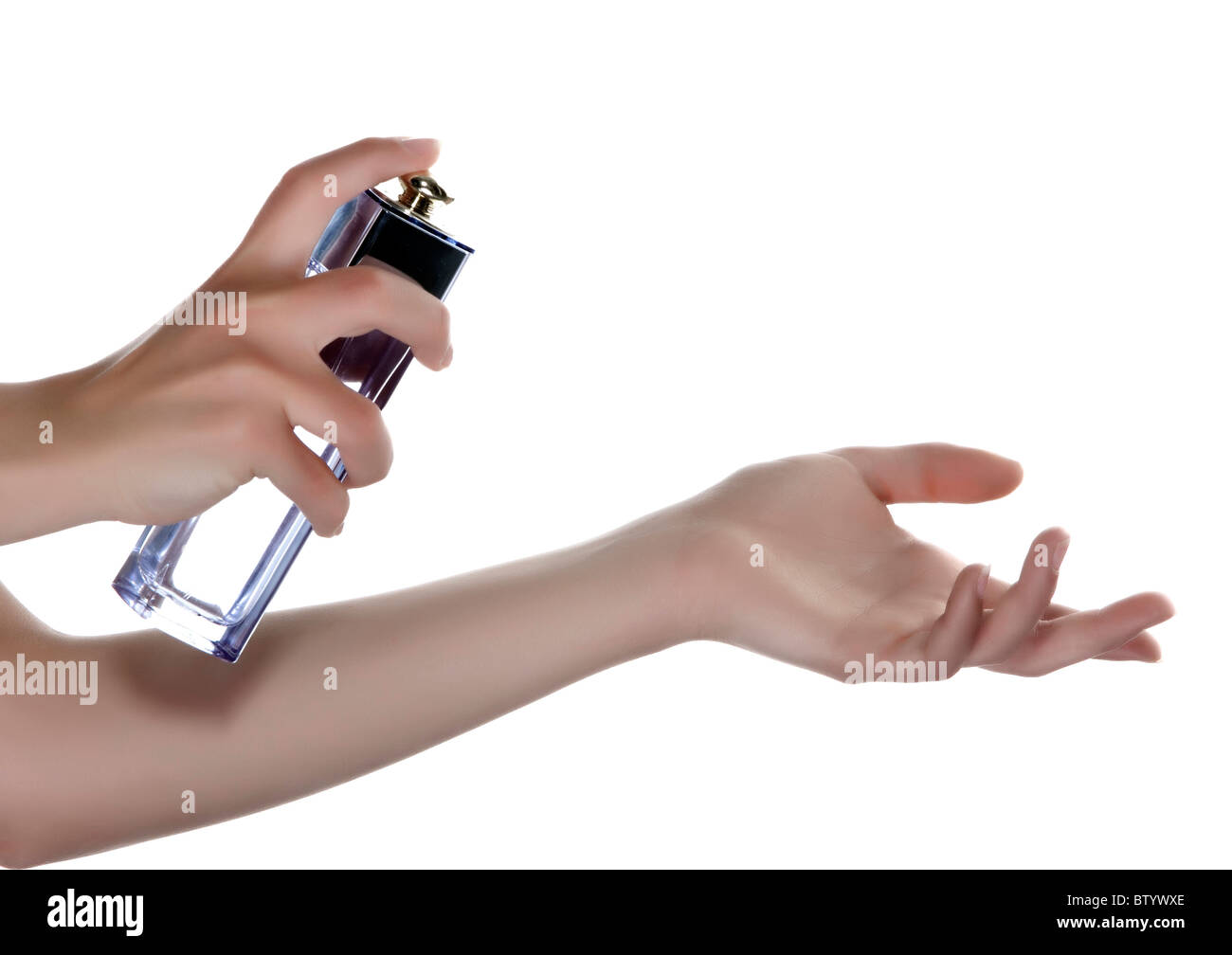 woman applying perfume Stock Photo - Alamy