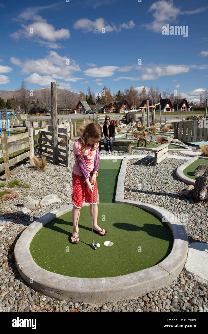 Young girl playing mini golf, Twizel, Mackenzie Country, Canterbury ...