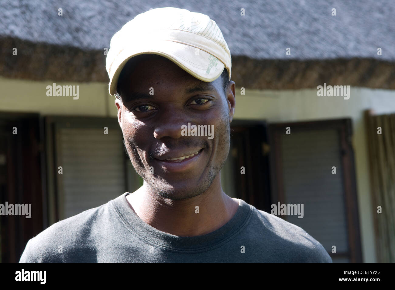 Portrait of a South African man smiling Stock Photo - Alamy