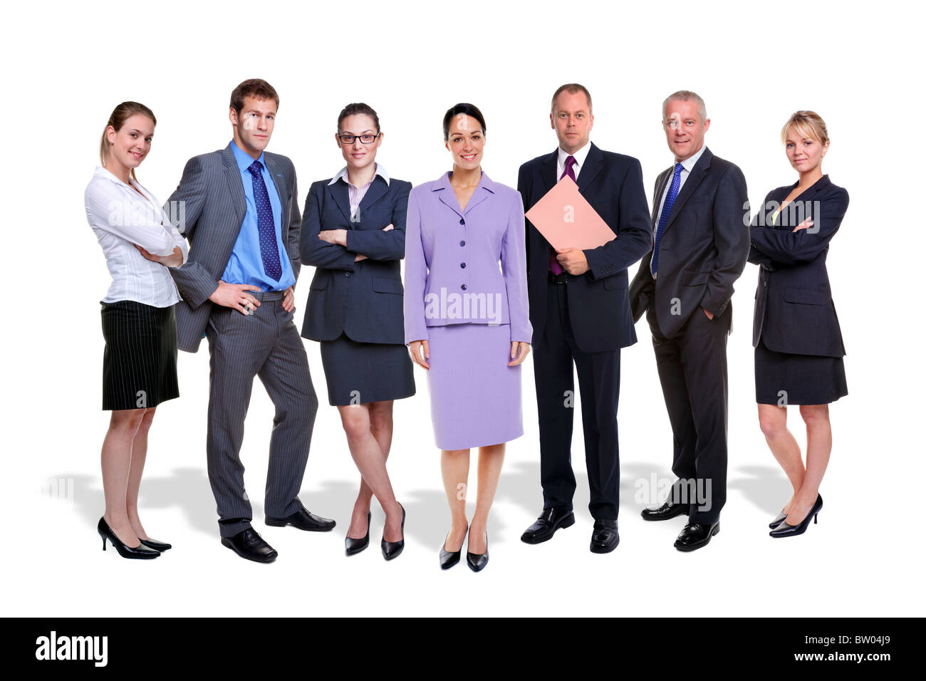 Photo of a seven person business team isolated on a white background ...