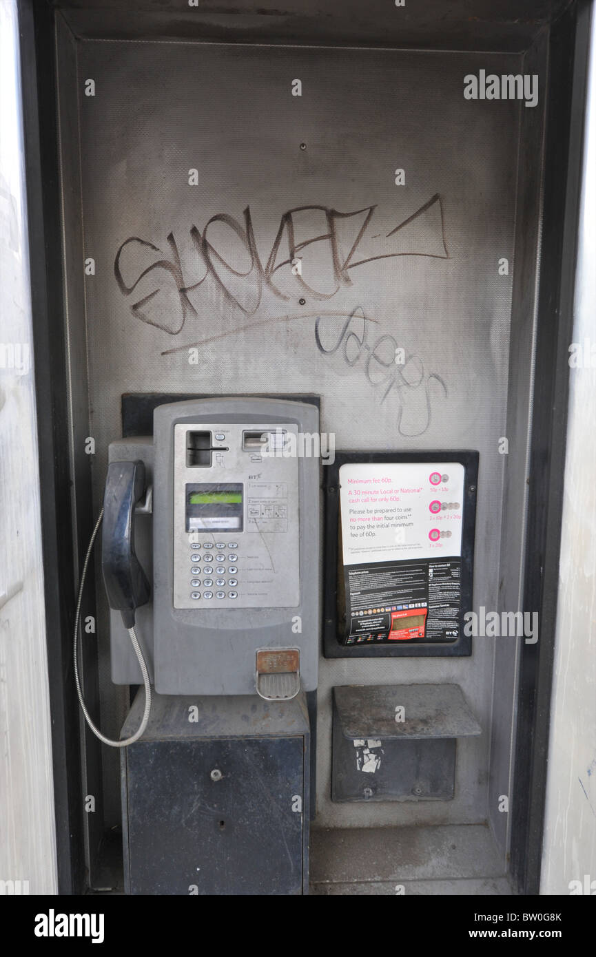 Telephone Booth with graffiti, Hanwell, UK Stock Photo - Alamy