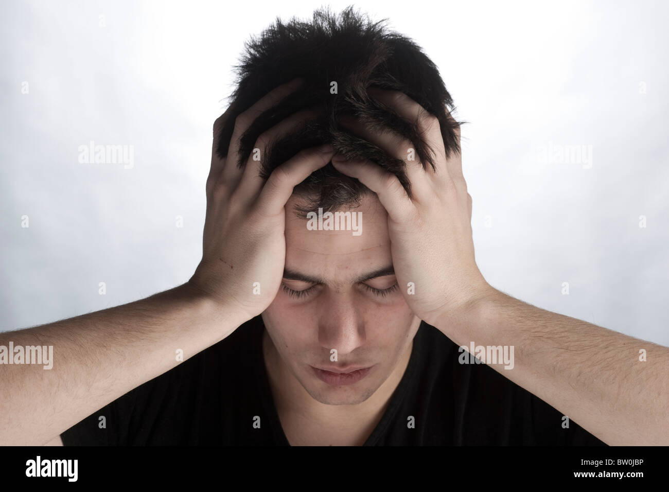 portrait of young sad male Stock Photo - Alamy