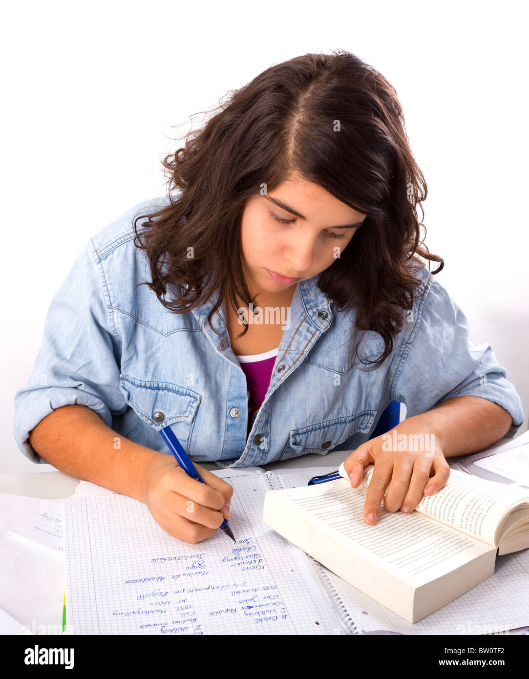 Young Teenage Girl is doing her homework Stock Photo - Alamy