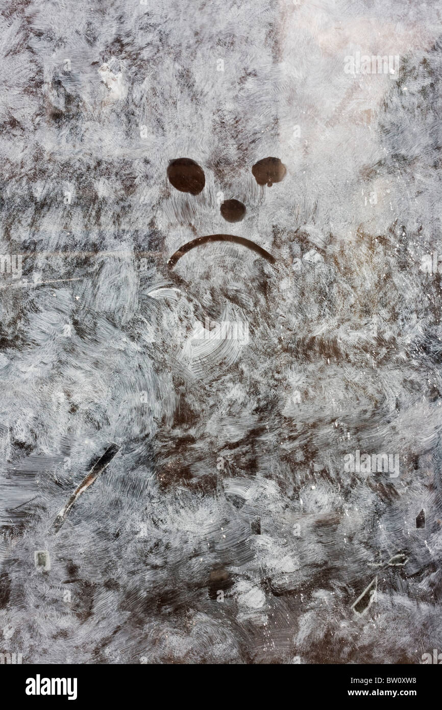 White emulsion paint smeared over the words CD and cassettes in the ...