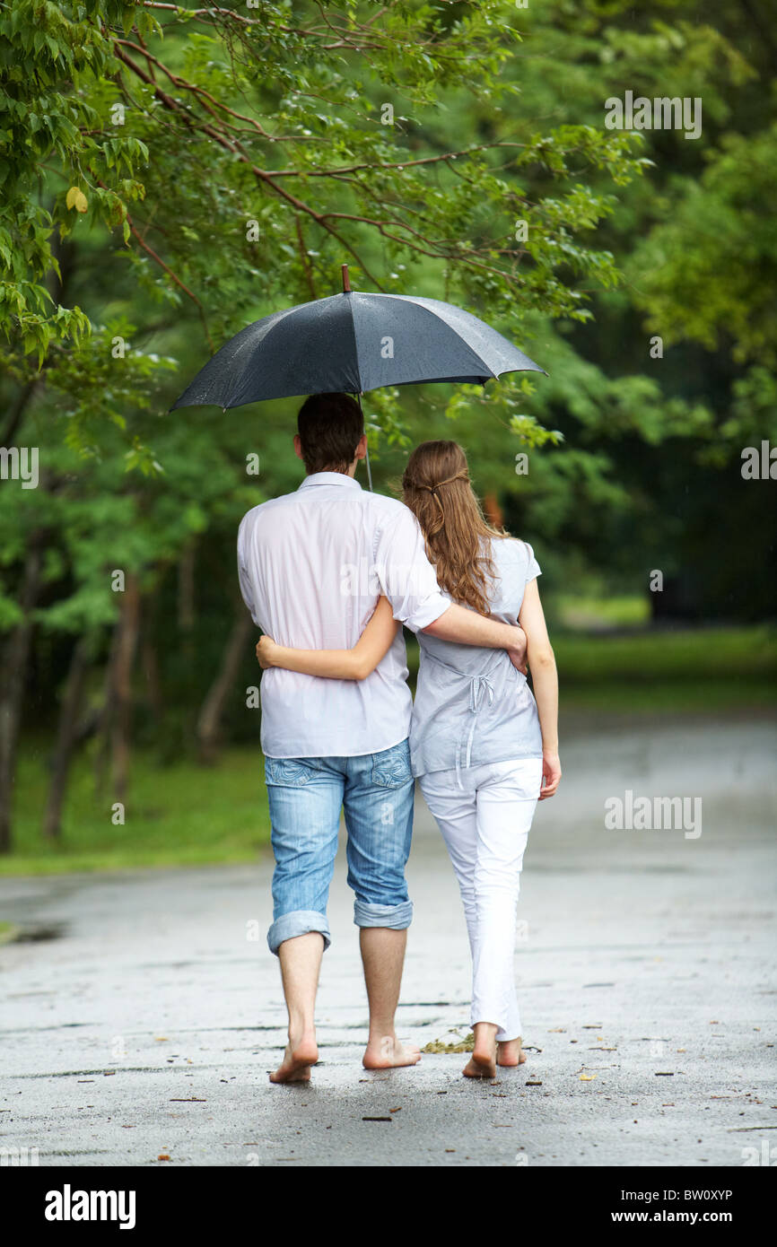 Hugging Couple In Rain