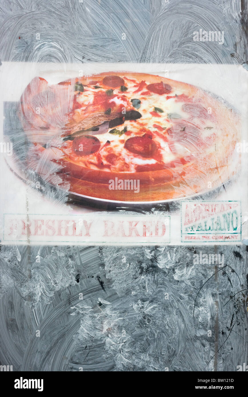 Emulsion paint smeared over window of fast food shop Top Nosh, a victim ...