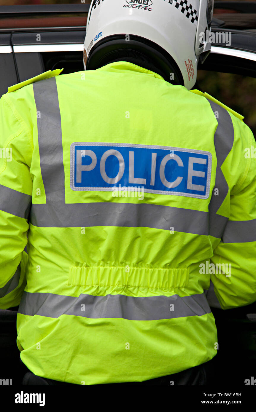 Yellow jacket policeman hi-res stock photography and images - Alamy