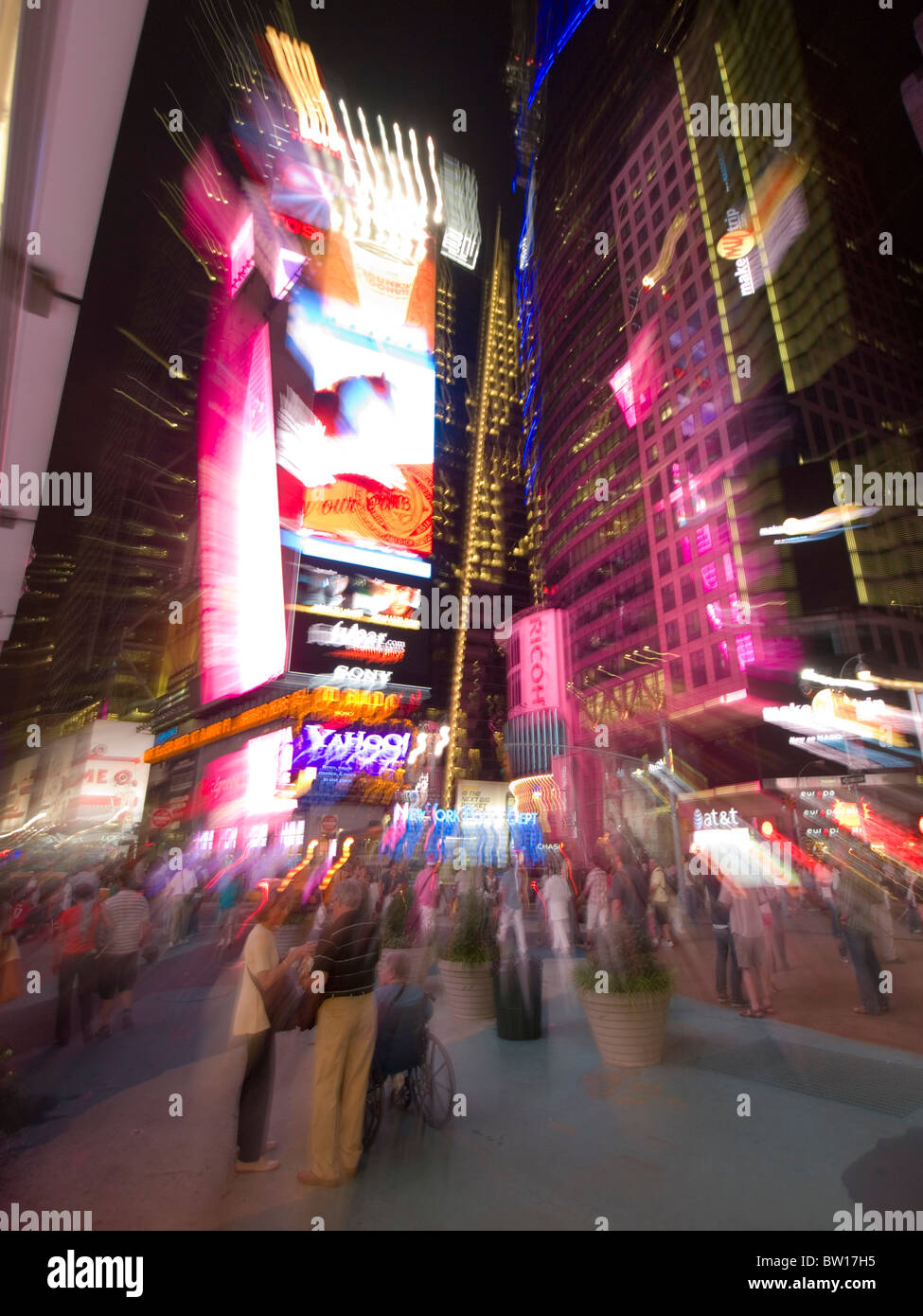 Neon lights of Times Square exaggerated by zooming Stock Photo - Alamy