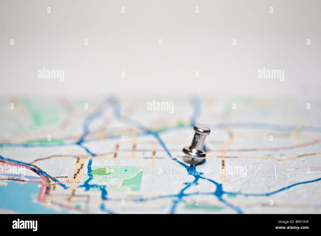 push pin in colorful map Stock Photo - Alamy