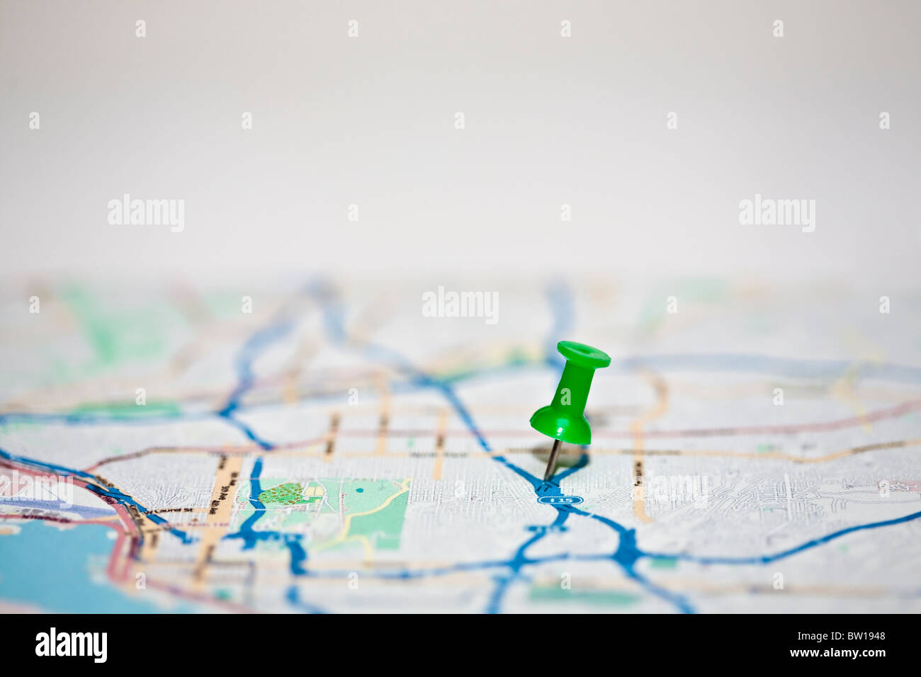 push pin in colorful map Stock Photo - Alamy