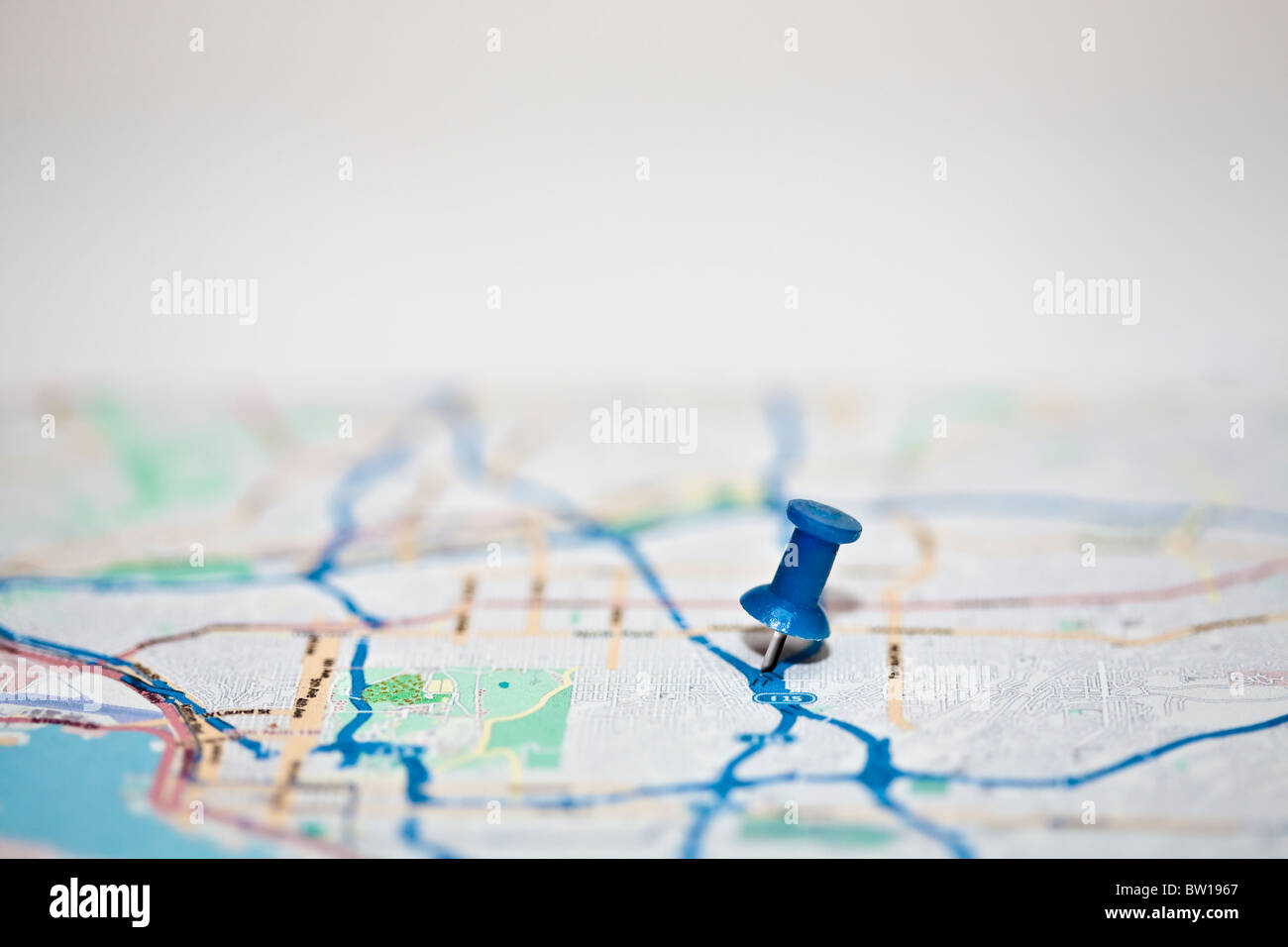 push pin in colorful map Stock Photo - Alamy