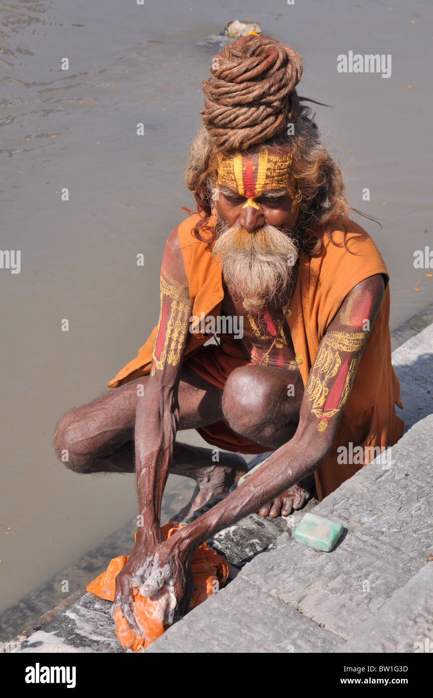 Sadhu washing by the Bagmati River, Pashupatinath Temple, Kathmandu ...