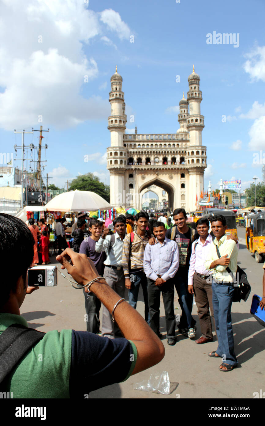View of Indian tourists being photographed in front of the Charminar ...