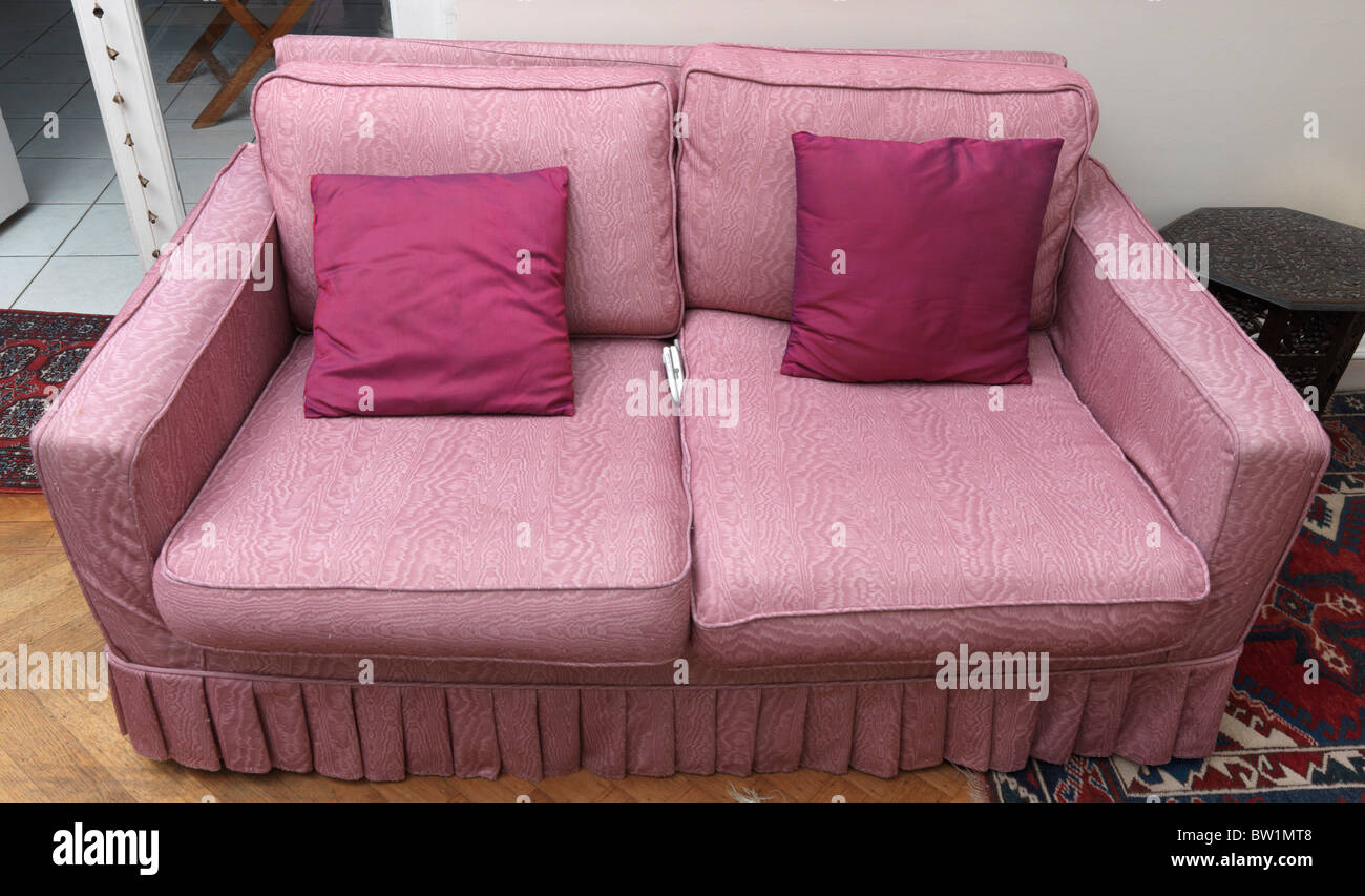 Phone lost between sofa cushions Stock Photo - Alamy