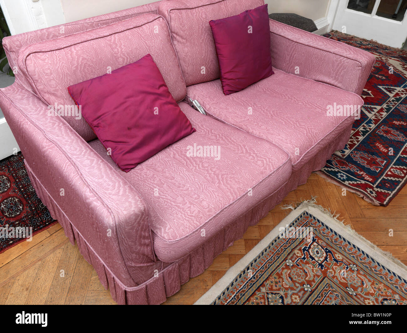 Phone lost between sofa cushions Stock Photo - Alamy