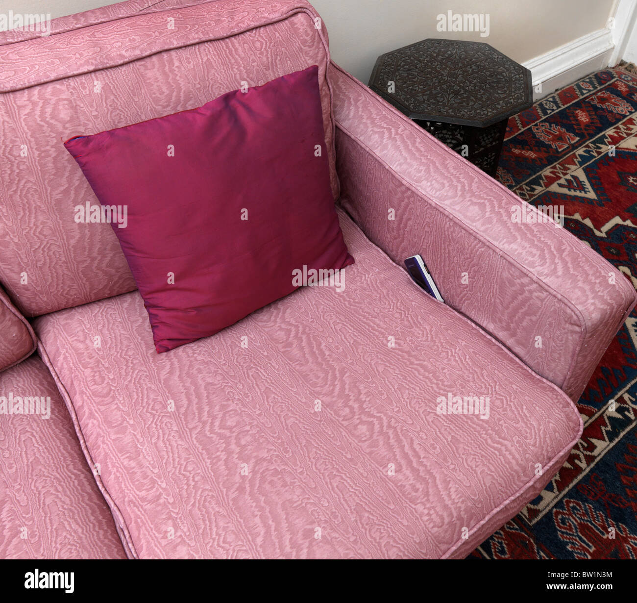 Phone lost between sofa cushions hi-res stock photography and images ...