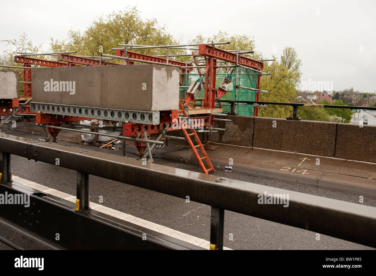Scaffolding Concrete Counterbalance weights on bridge Stock Photo - Alamy