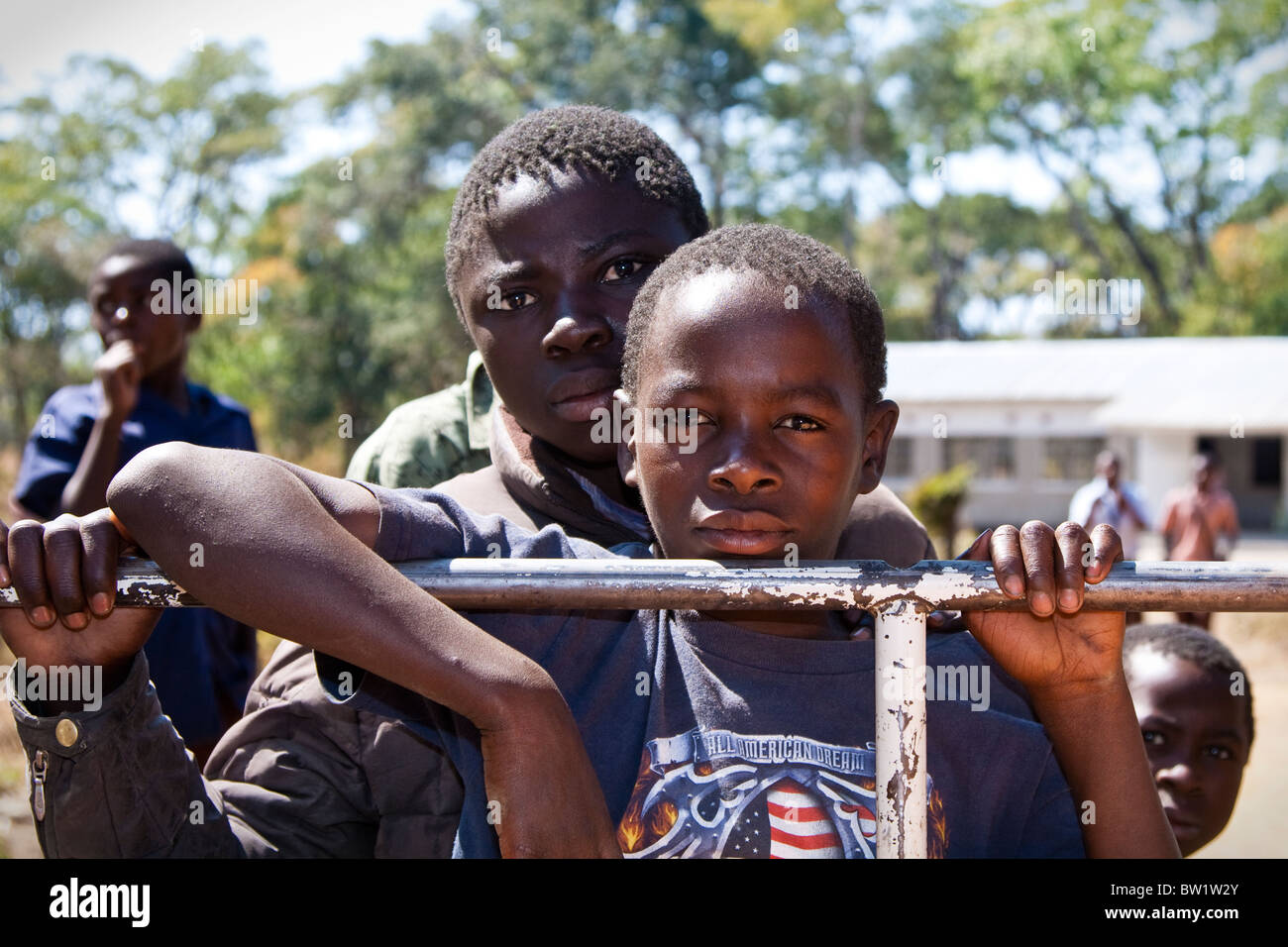 Young men in rural community in Zambia Stock Photo - Alamy