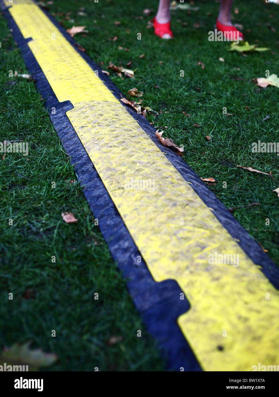 red shoes yellow line Stock Photo - Alamy