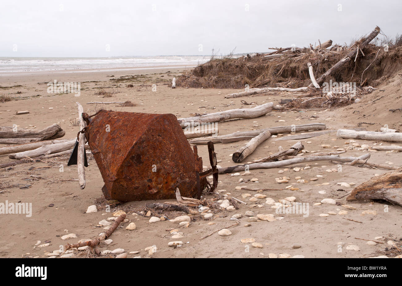 Rust buoy ashore Stock Photo - Alamy