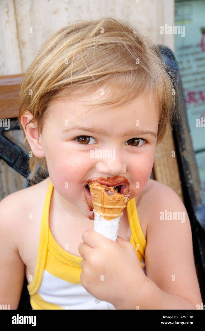 Child eatiing ice cream Stock Photo - Alamy