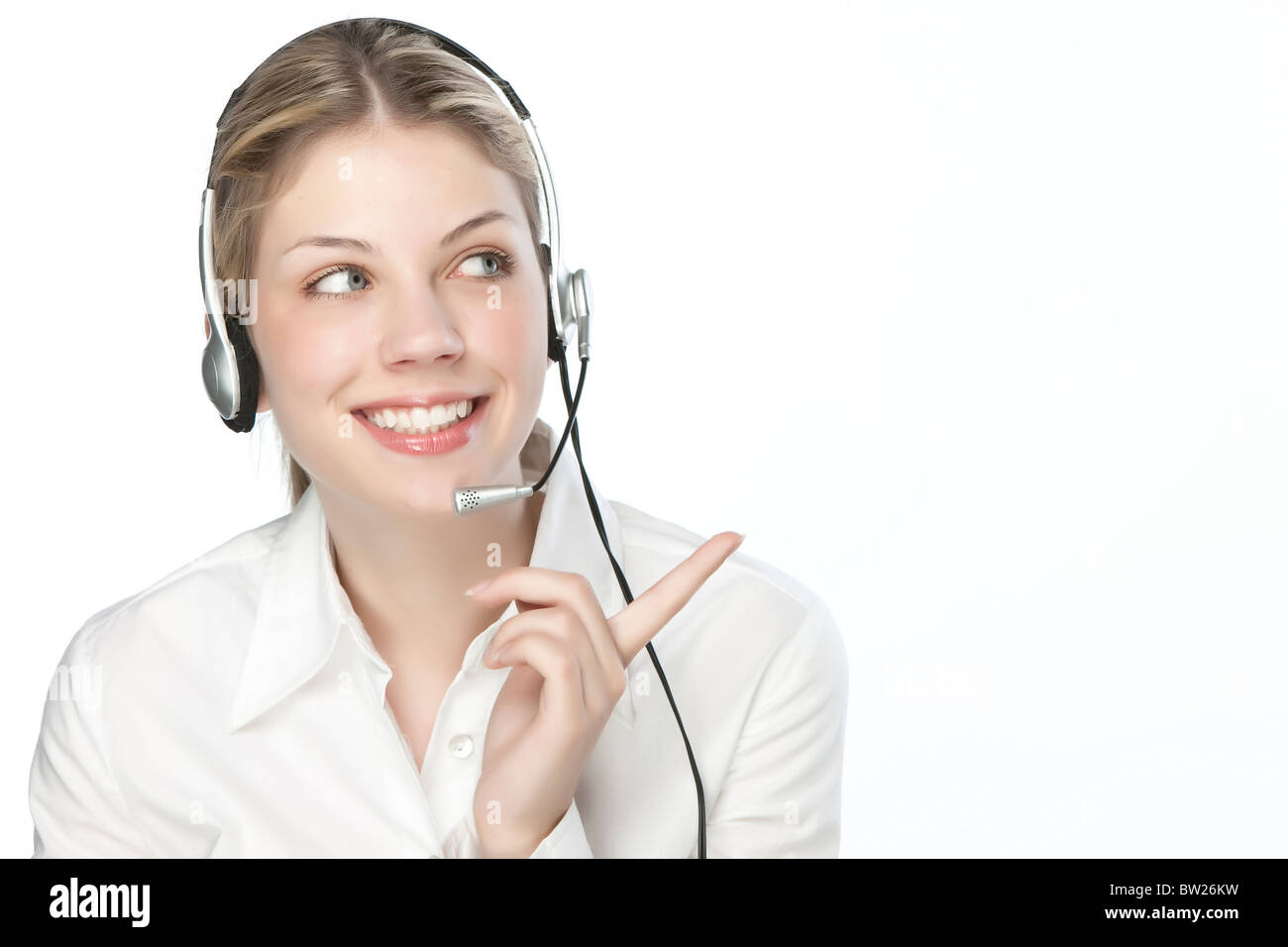 A friendly secretary/telephone operator in an office environment Stock ...