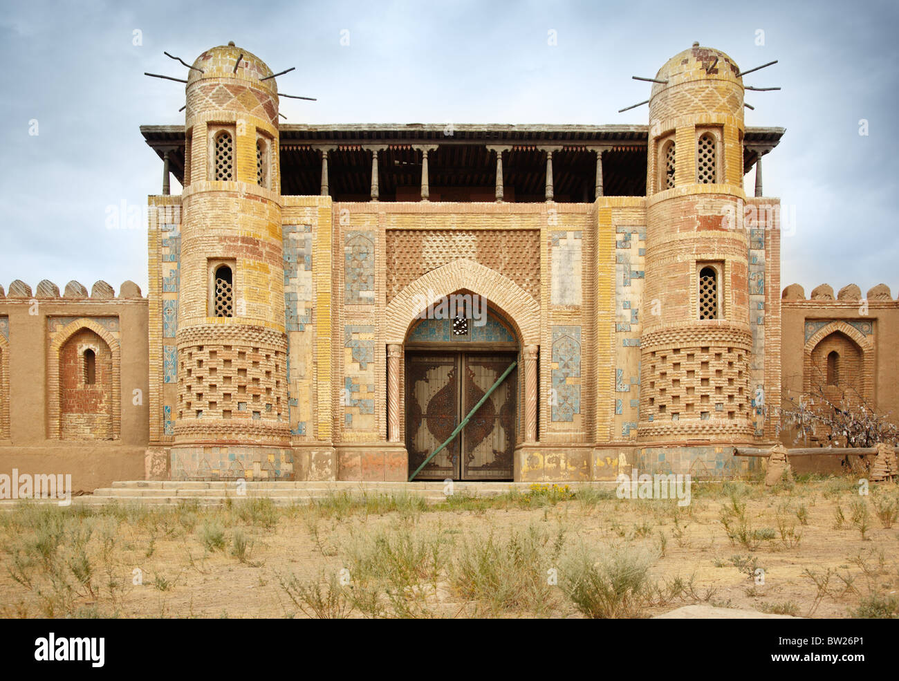 Ancient nomadic city in the steppe. Front view onto the old gates ...