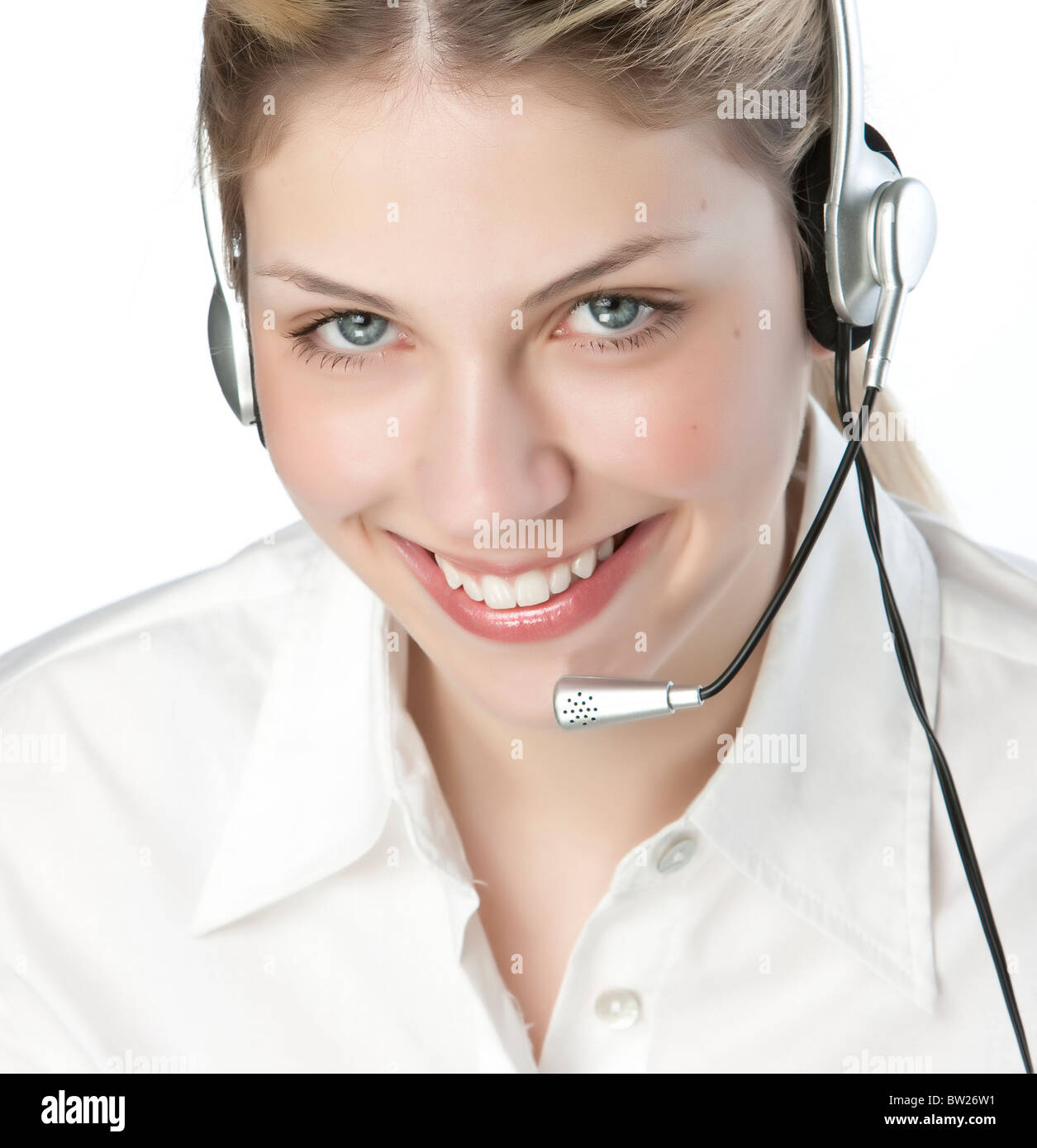 A friendly secretary/telephone operator in an office environment Stock ...