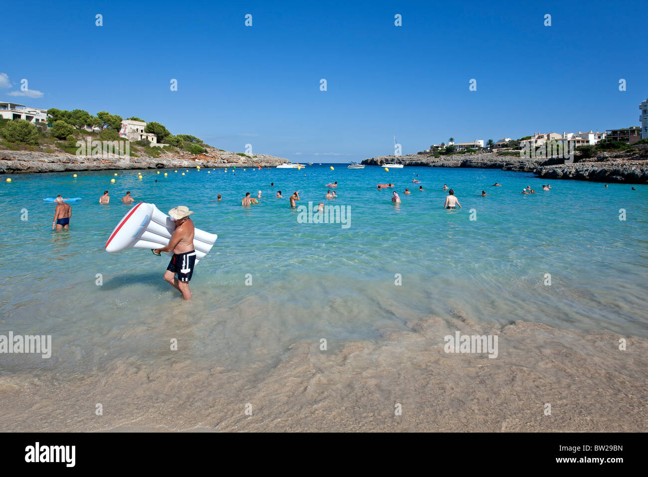 People swimming on the sea. Cala Marçal beach. Mallorca Island. Spain ...
