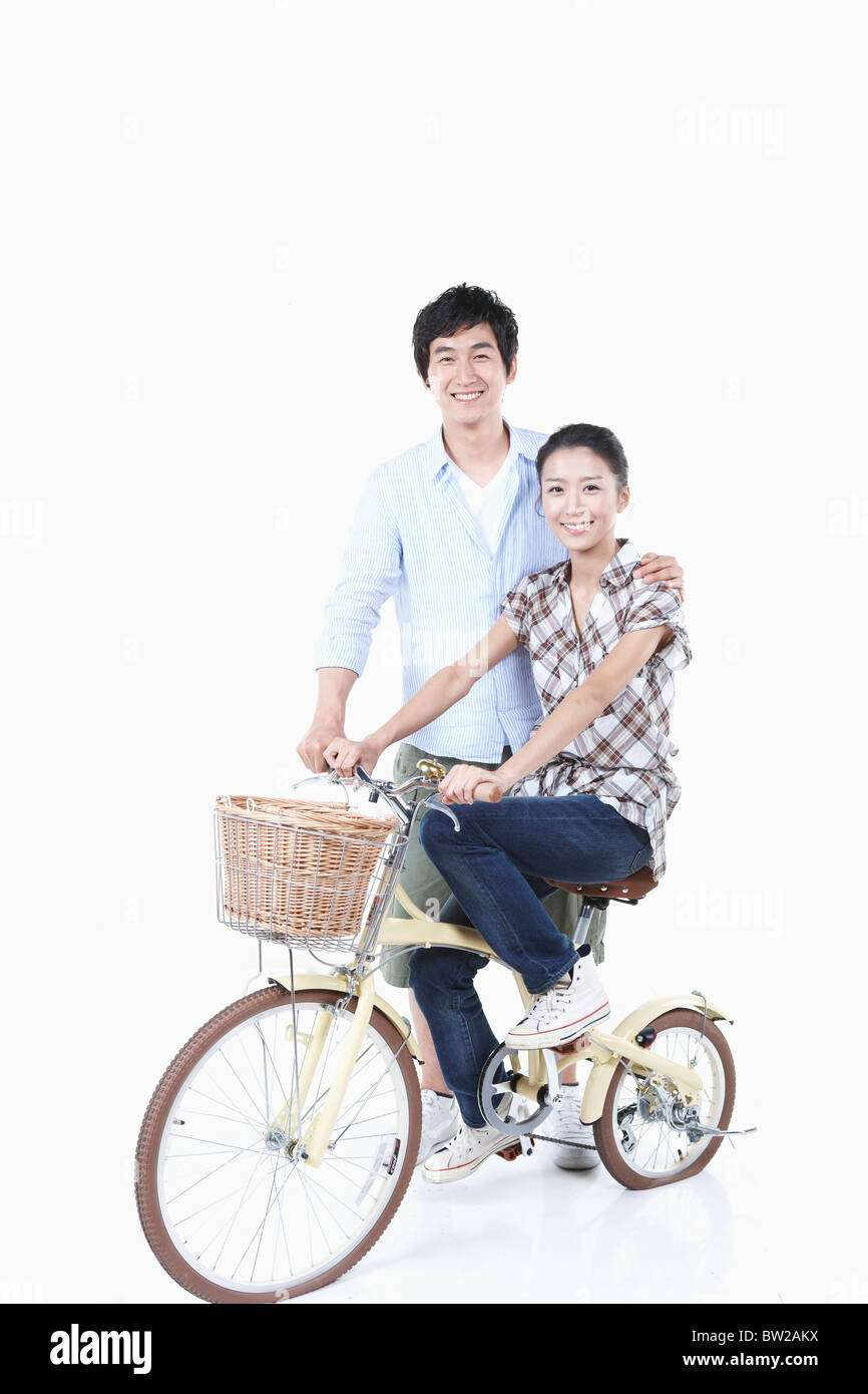 Young woman man riding Cut Out Stock Images & Pictures - Alamy