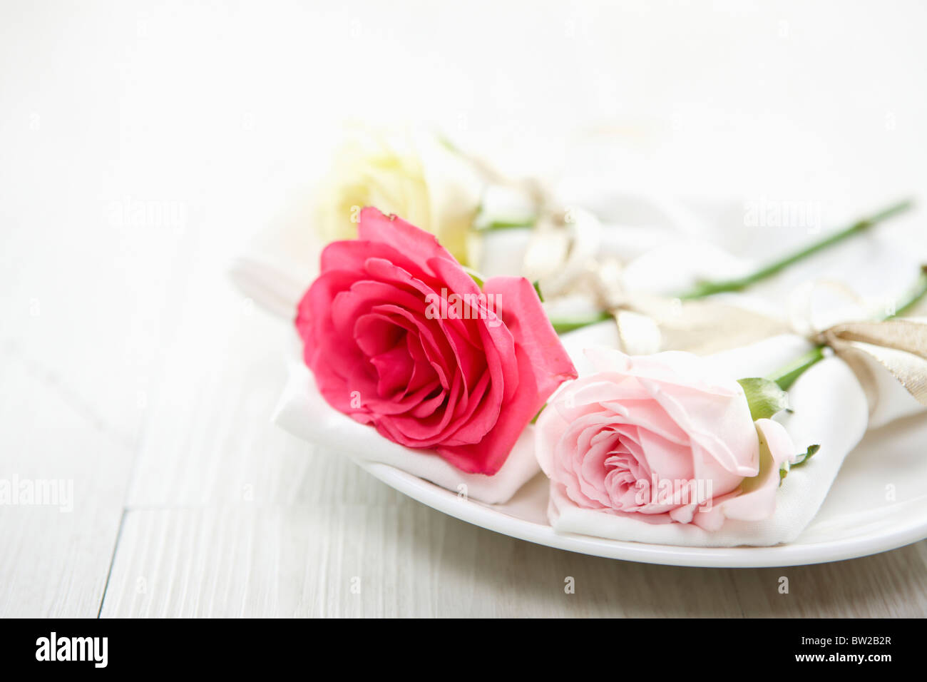 decorated plate with roses Stock Photo - Alamy