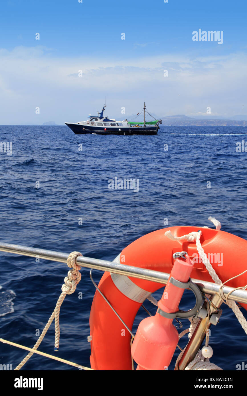 fishing trawler professional boat working in blue ocean sea Stock Photo ...