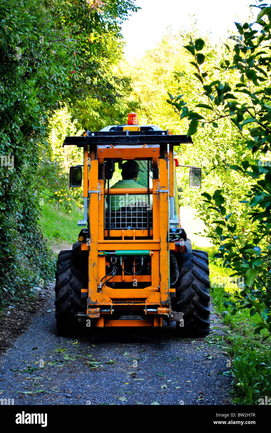 small tractor on the road Stock Photo - Alamy