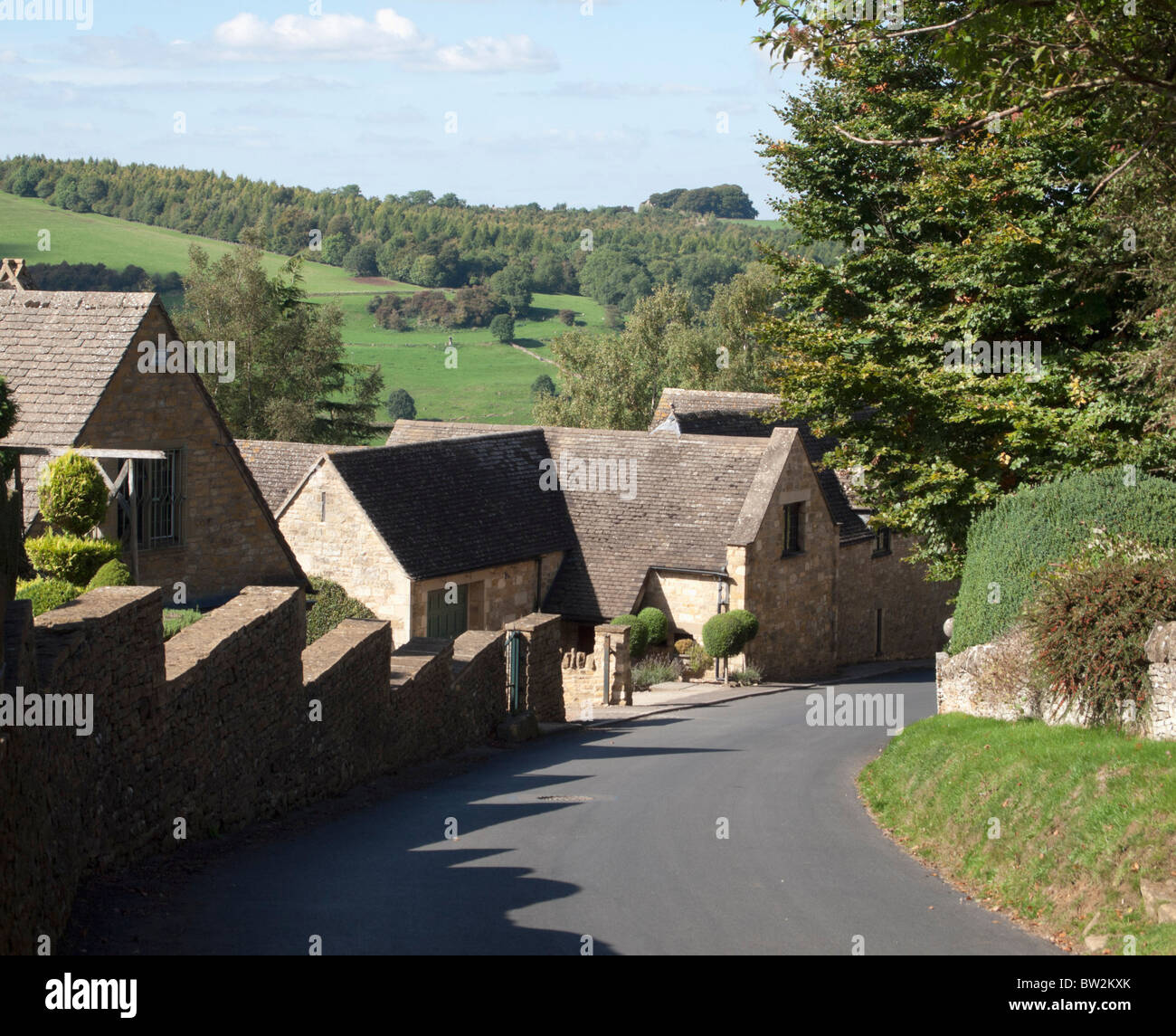 village with houses in countryside - snowshill the cotswolds ...