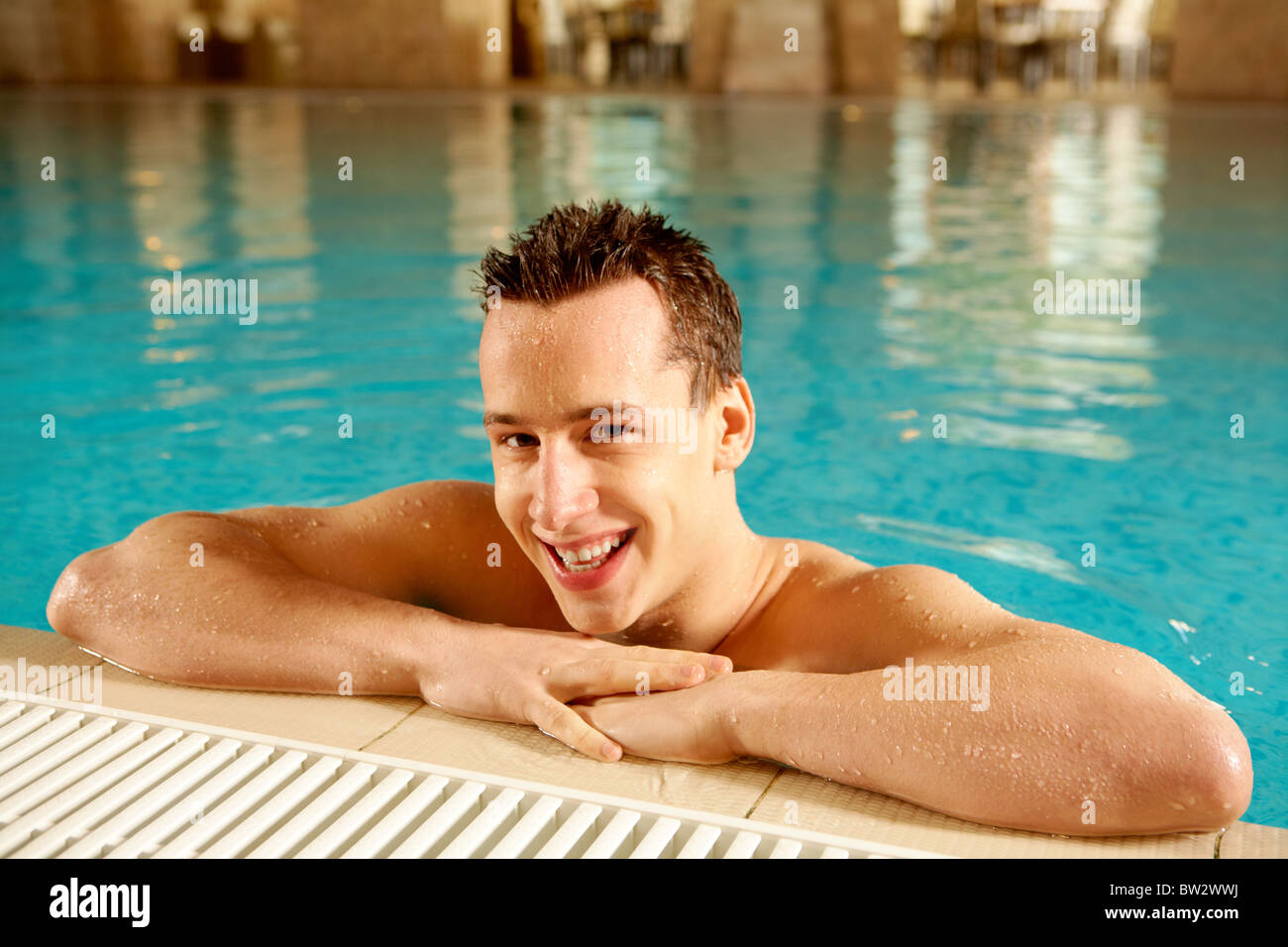 Portrait of happy swimmer in swimming pool Stock Photo - Alamy