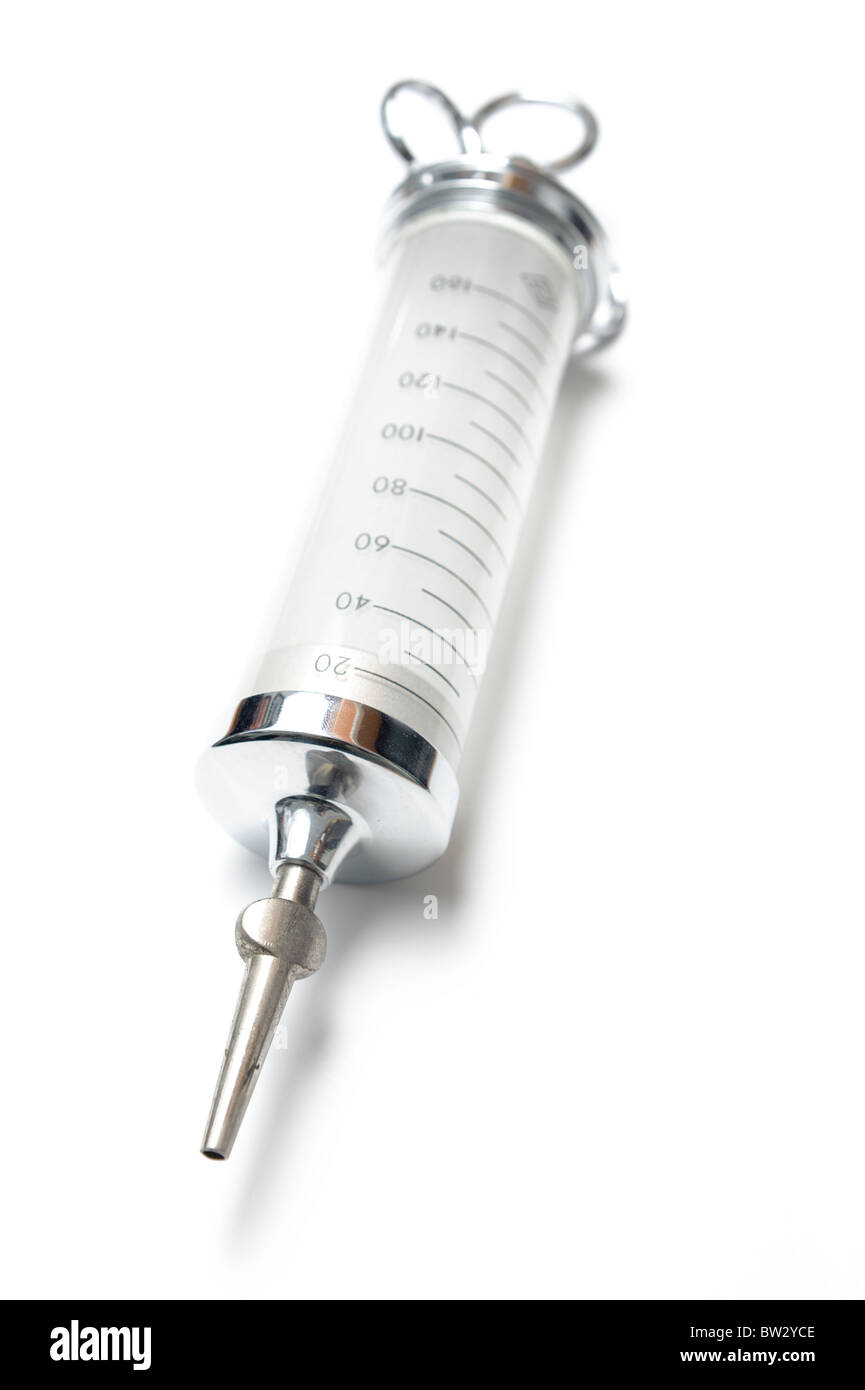 Large syringe cut out Stock Photo - Alamy