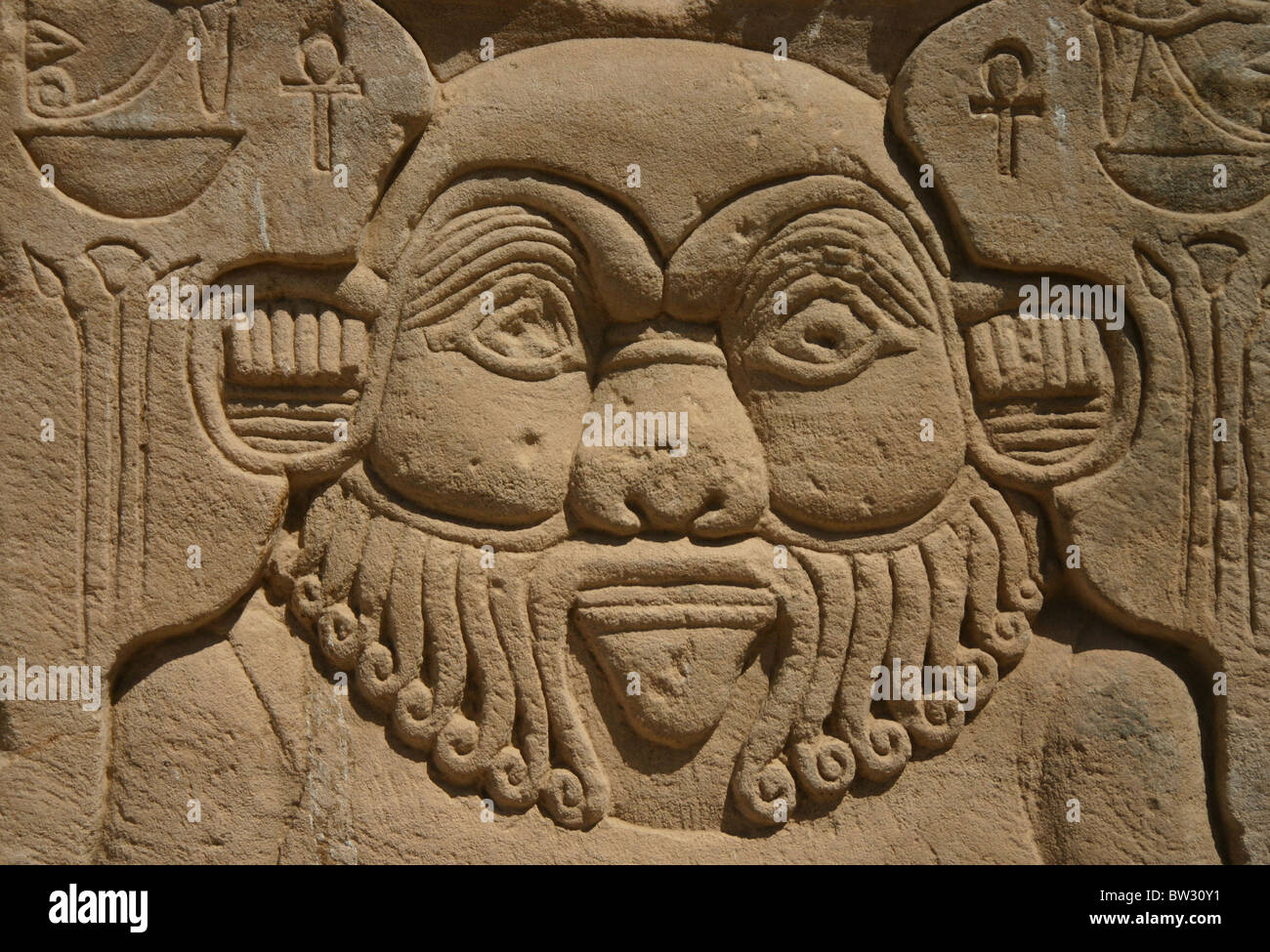 The god Bes in the temple of Philae, Aswan, Egypt Stock Photo - Alamy