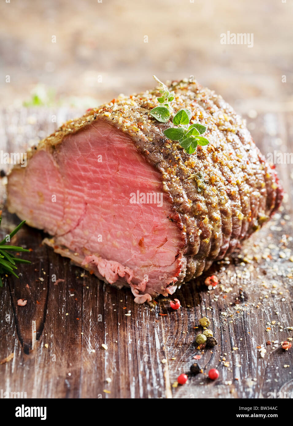 juicy roast beef covered in herbs Stock Photo - Alamy