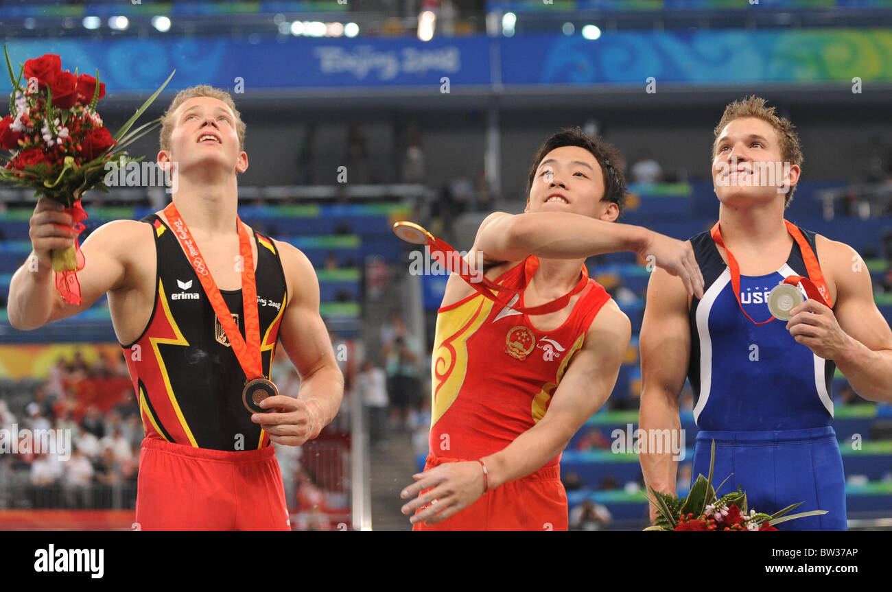 Chinas zou kai usas jonathan pose with their bronze hi-res stock ...