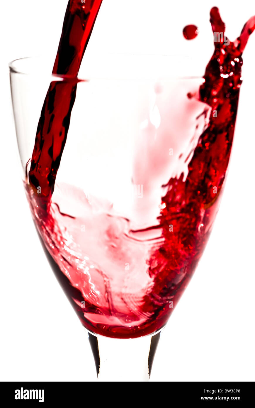 red wine is flowing into the wine glass Stock Photo - Alamy